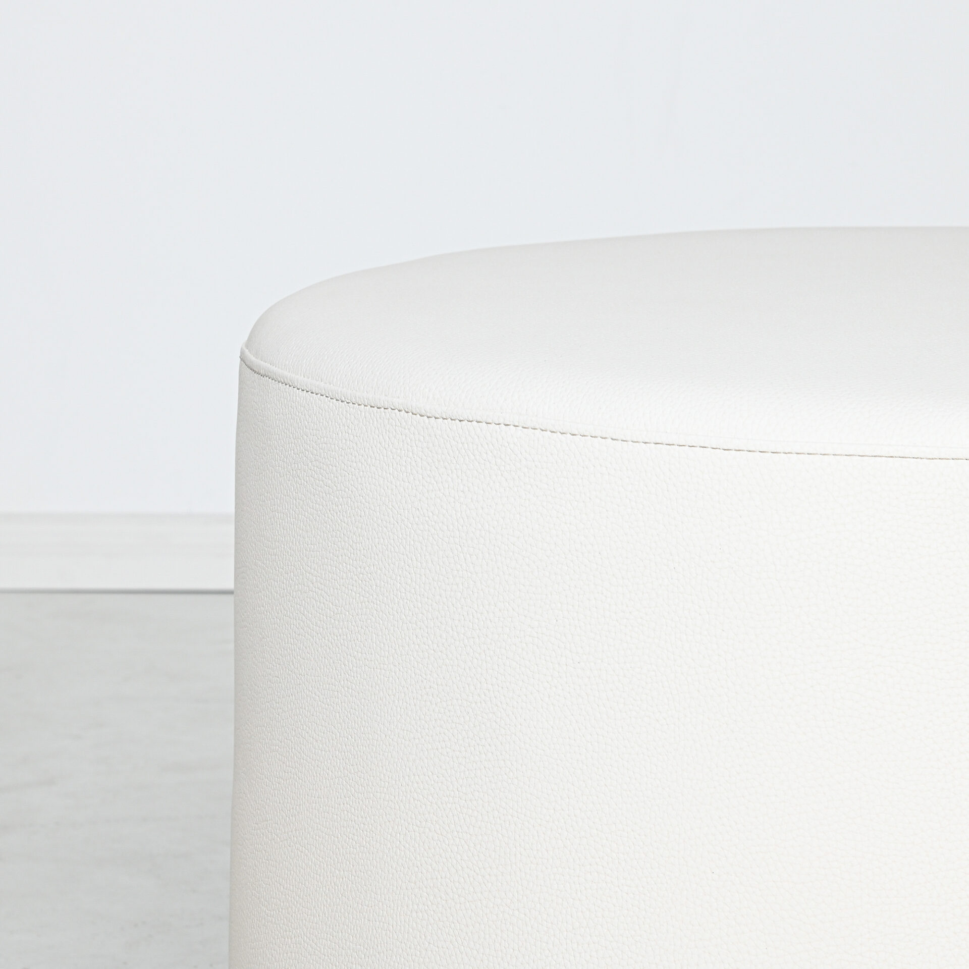 Round Beige Leather Ottoman
