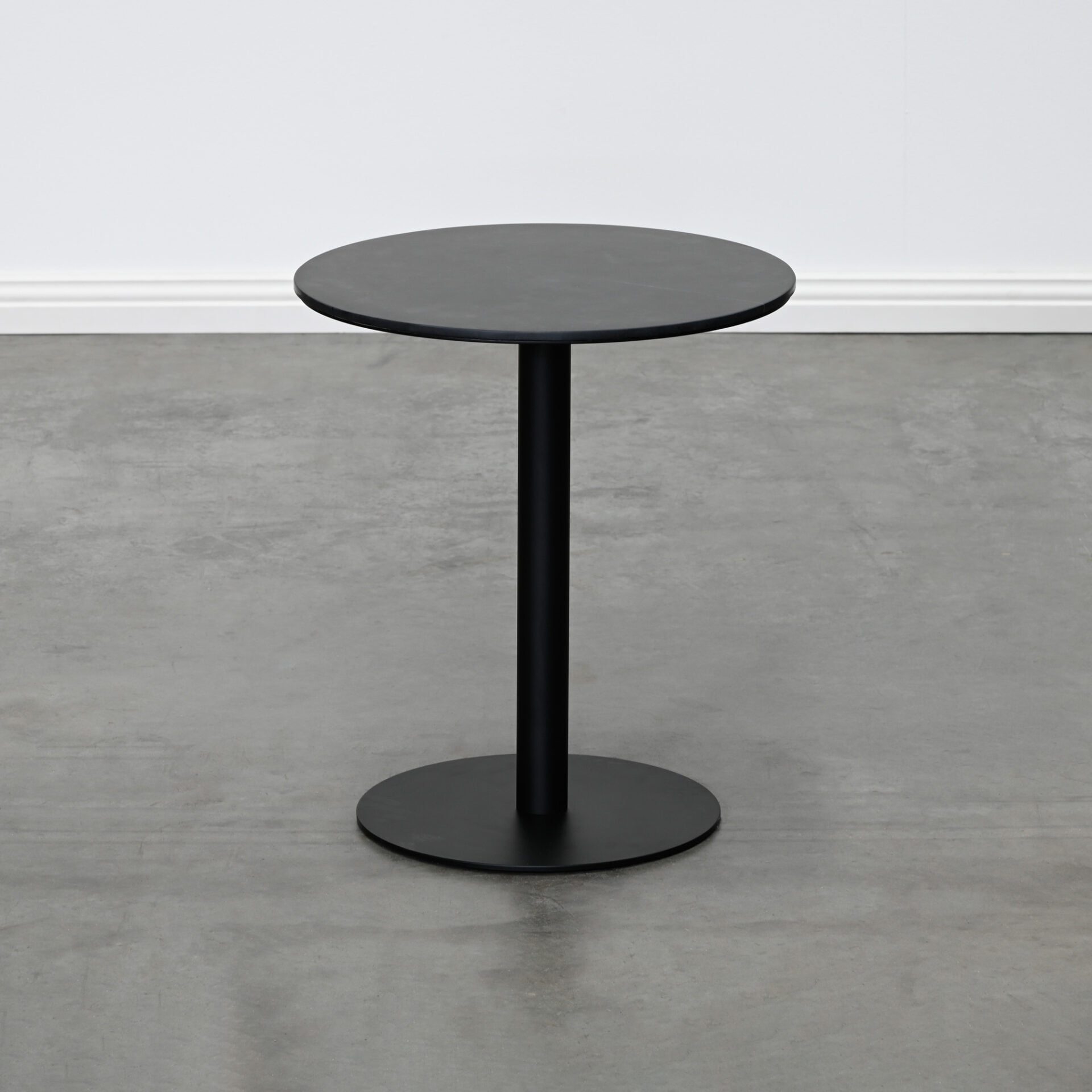 Round black side table