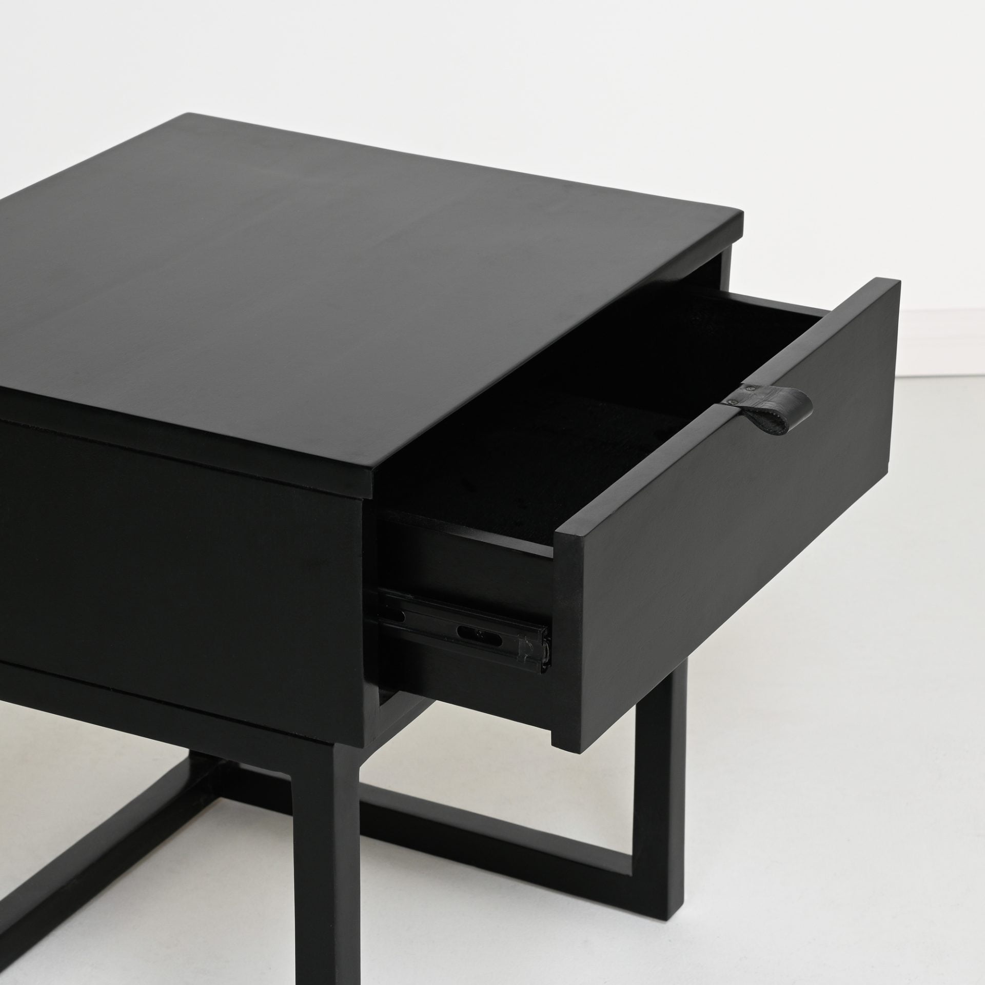 Black wood bedside table