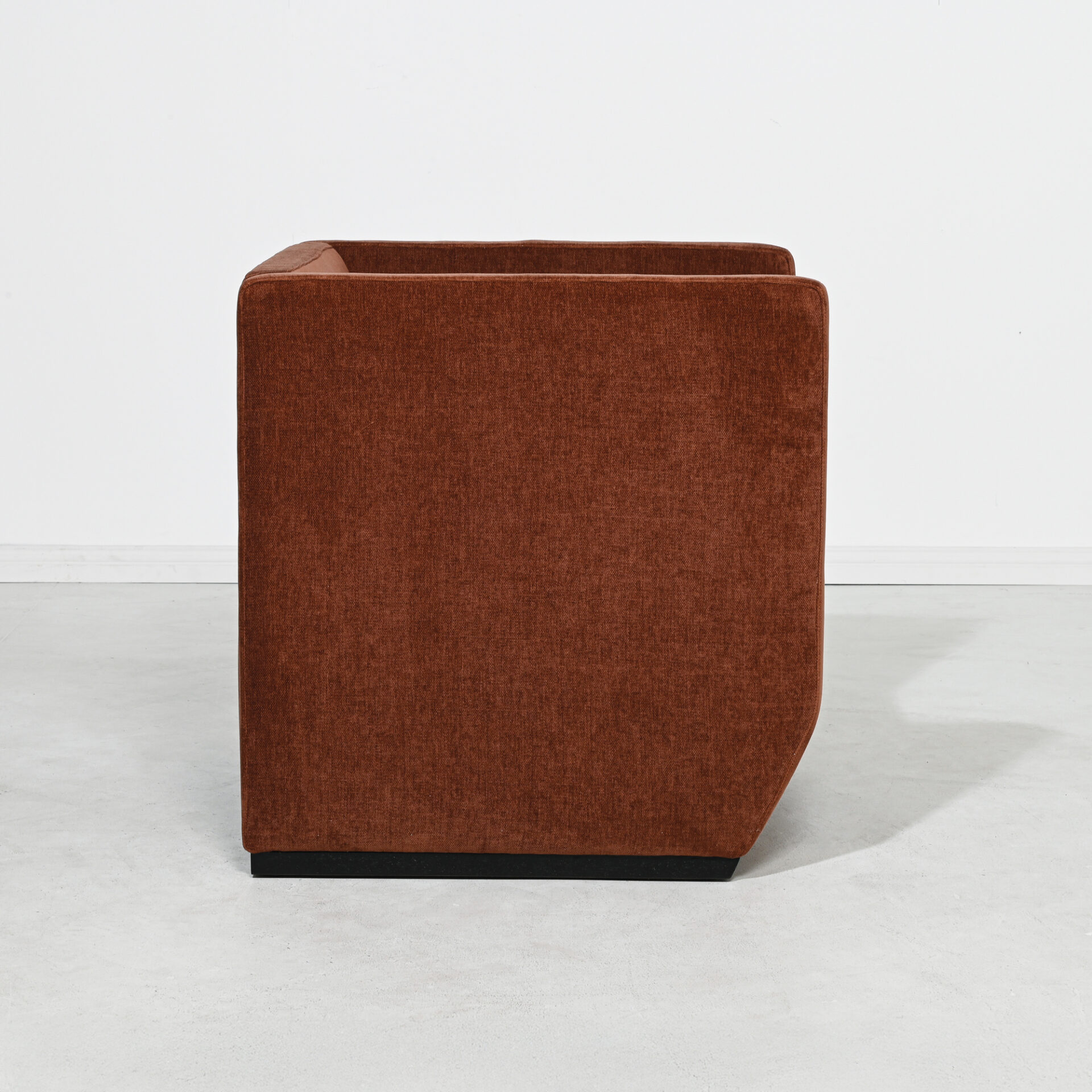 Brick red cube chair wood base