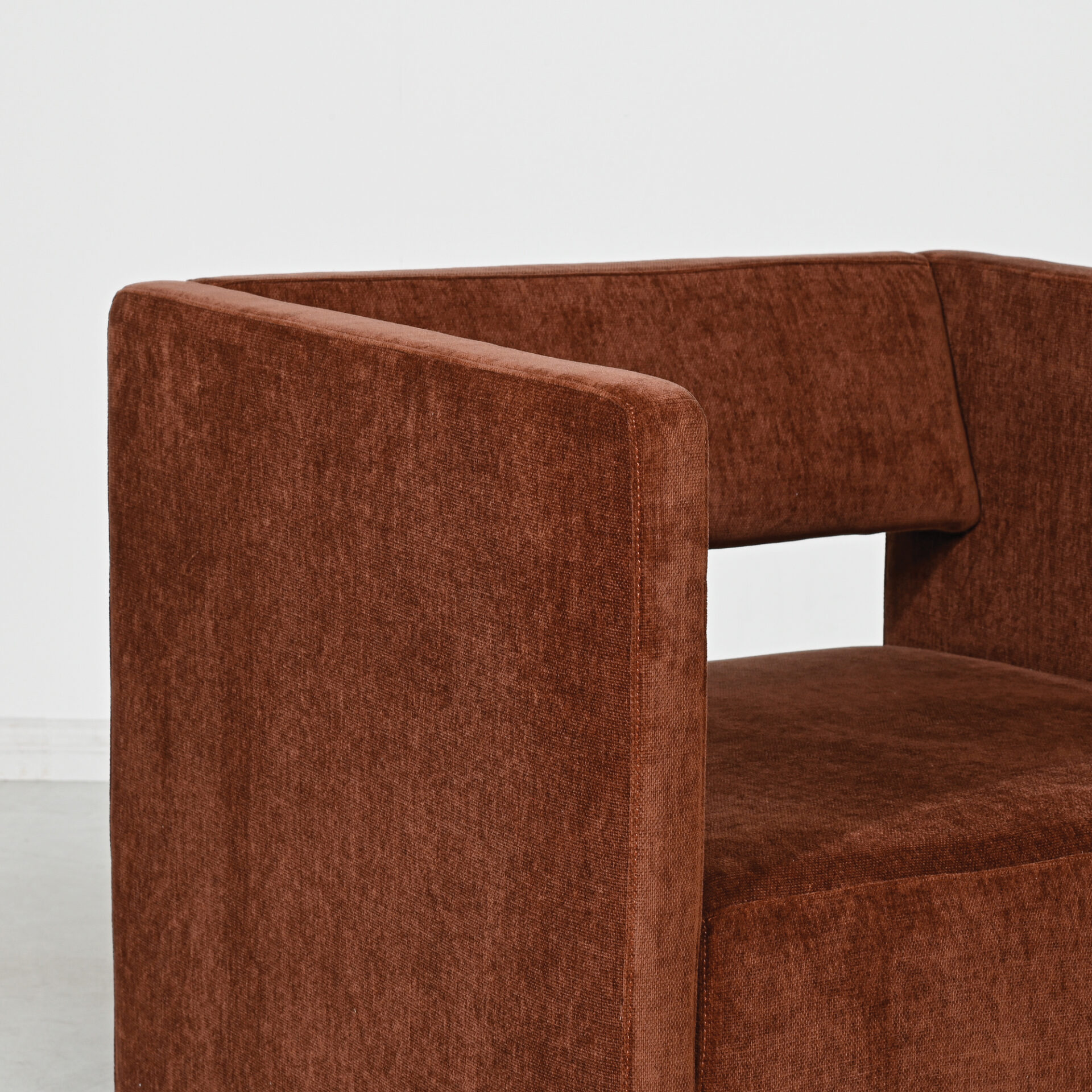 Brick red cube chair wood base