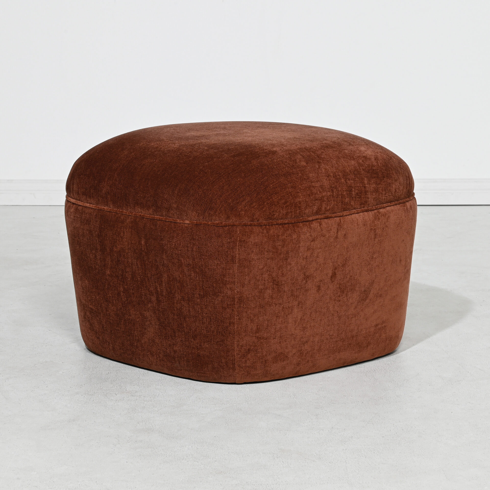 Rounded square brick ottoman
